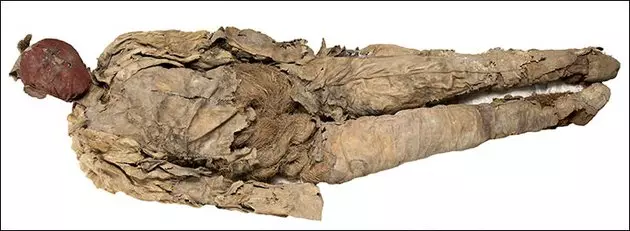 Muinaisen Tashtkovin hautaaminen nukke
